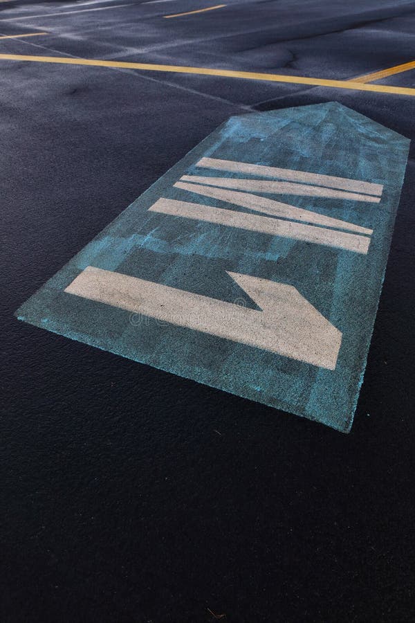 Sign on airport ramp stock photo. Image of aviation, dark - 70608100