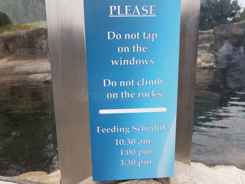 Sign on Animal Cage No Tapping No Climbing Stock Image - Image of rocks ...