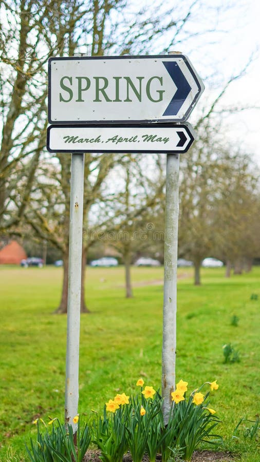 Decorative Sign with a Welcoming Spring Message and Fresh Flowers ...