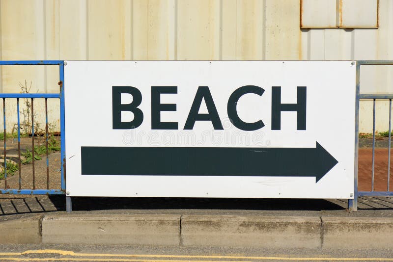 A Sign Showing the Way To the Beach Stock Image - Image of text, white ...