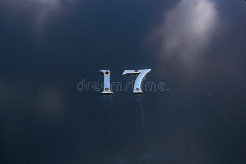 17 sign on black wall stock photo. Image of font, icon - 170341378