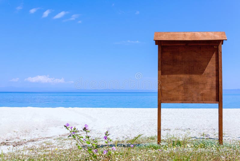 Sign board on a beach stock image. Image of shadow, plant - 107925625