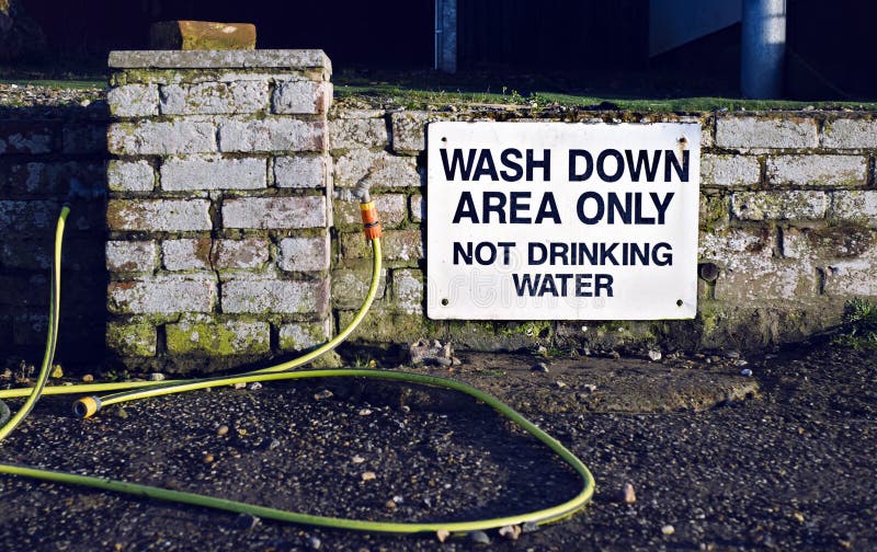Sign on the Brick Fence. Wash Down Area only. Not Drinking Water Stock ...