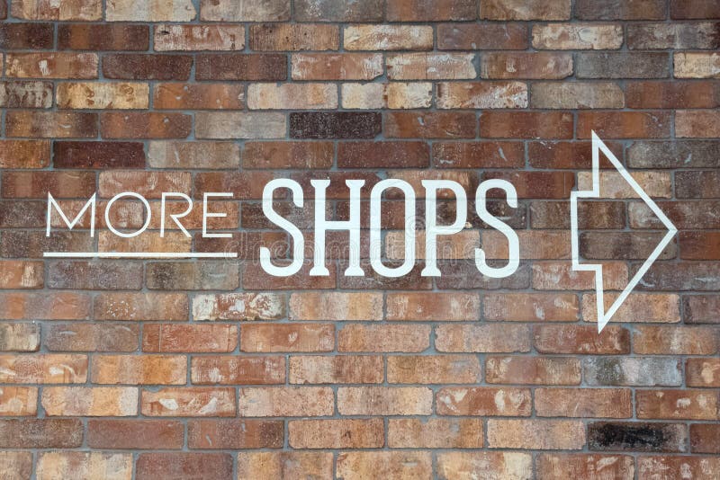 Sign leads to more shops stock image. Image of dollar - 260229441