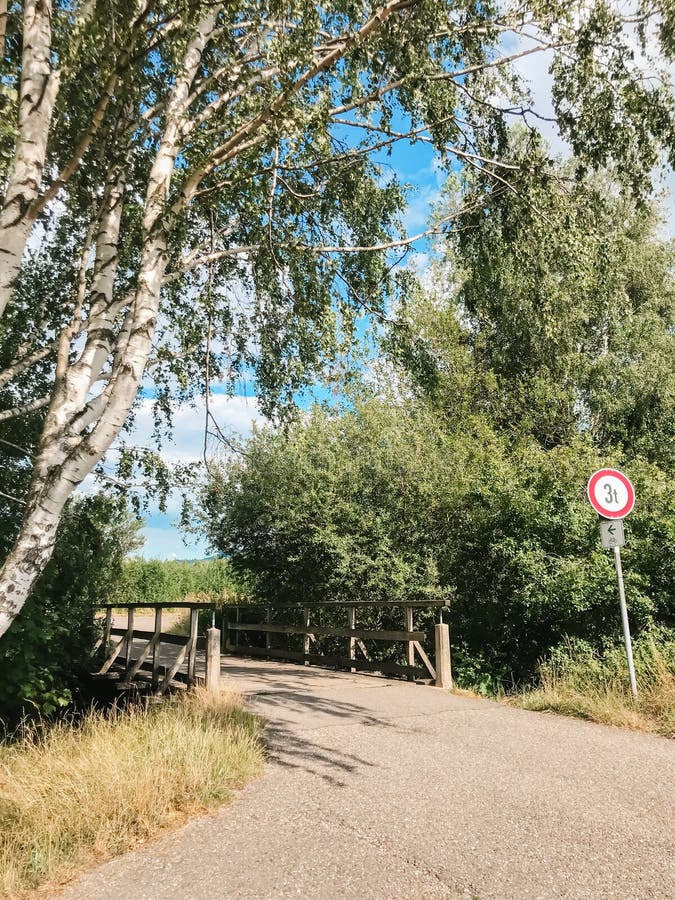A Sign on a Bridge Warns Drivers To Slow Down Stock Image - Image of ...