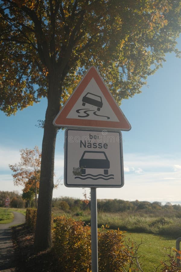 A Sign with a Car on it and the Word Nasse Written Below it Stock Photo ...