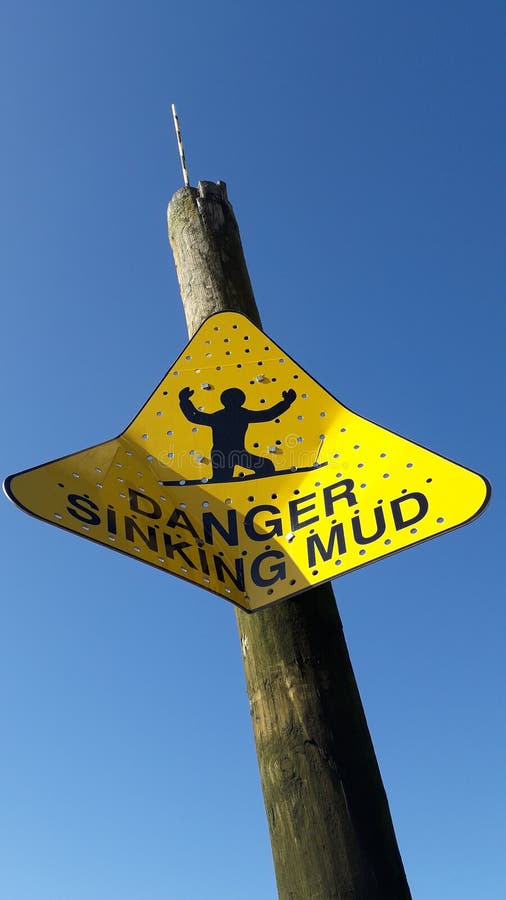 Sign Caution Sinking Sand Tower Stock Photo - Image of sign, sand ...