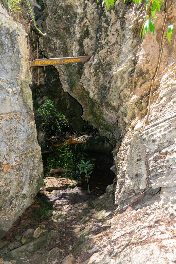 Sign of Caution between Two Rocks Stock Photo - Image of sign, rocks ...