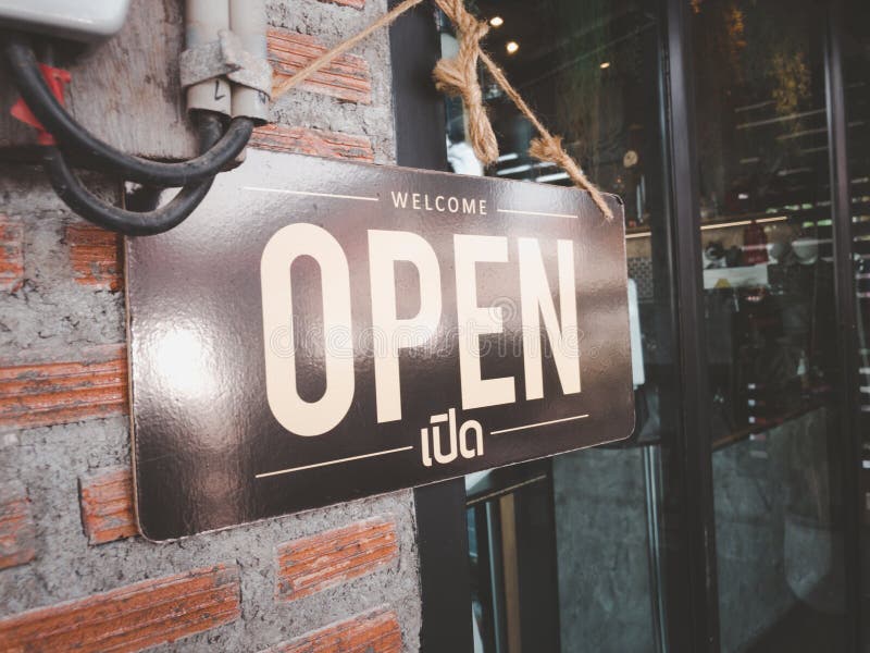 A Sign in a Close-up Cafe with the Words Welcome To Open Stock Image ...