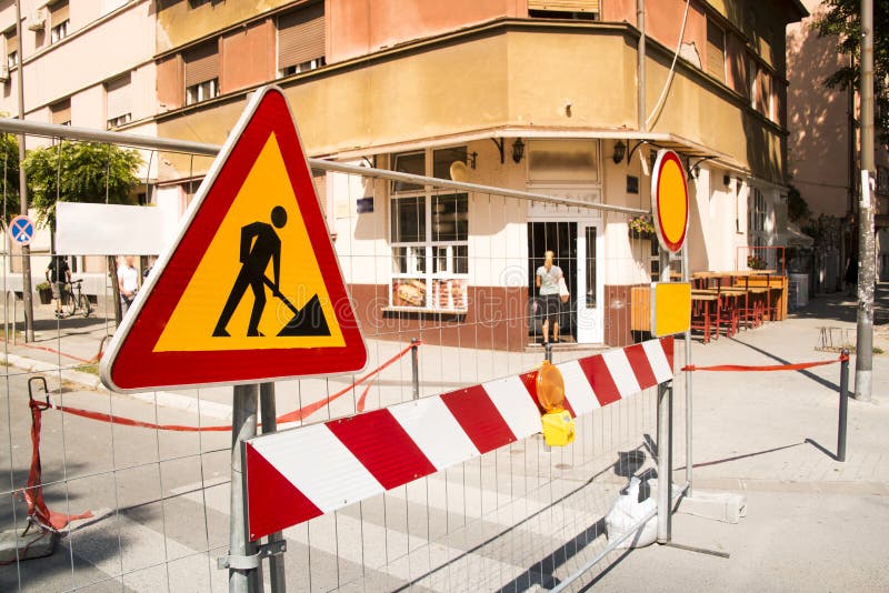 A Sign Denoting Work on the Road Stock Image - Image of danger ...