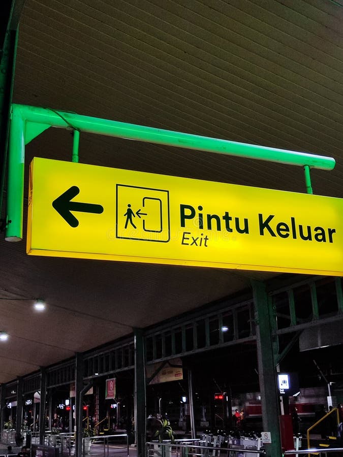 Sign Direction at Train Station Stock Image - Image of night, lighting ...