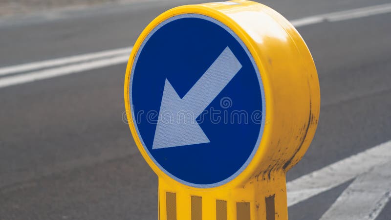 Sign Direction of Travel on Yellow Stand Stock Image - Image of ...