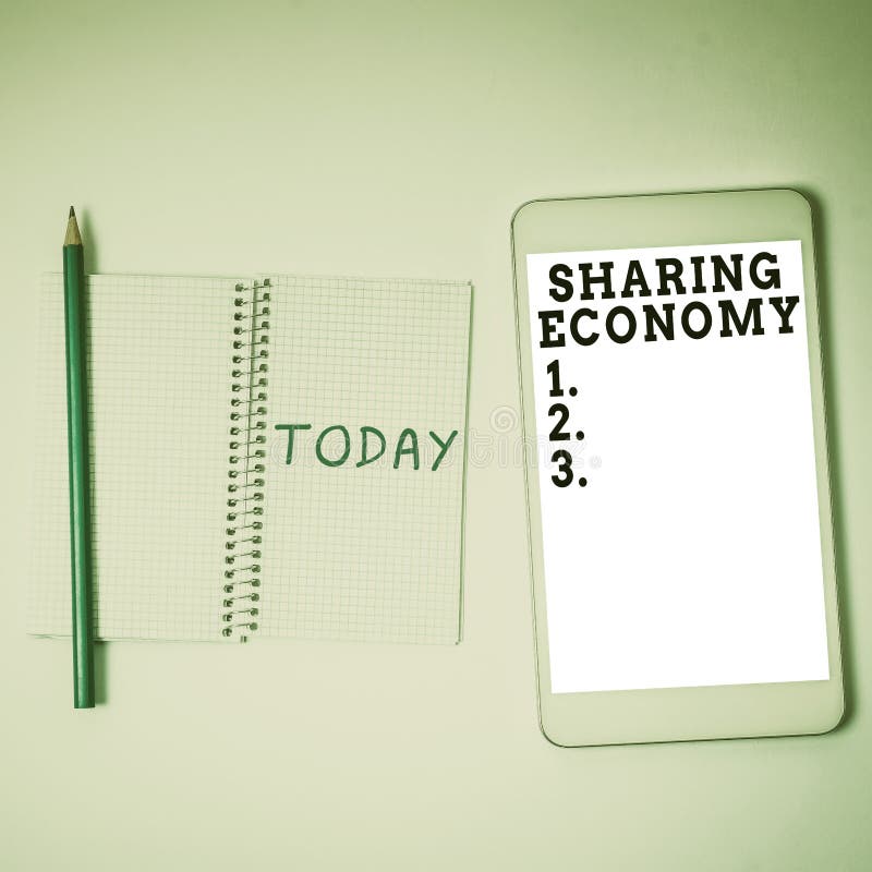 Sign Displaying Sharing Economy. Word Written on a System Where Assets ...