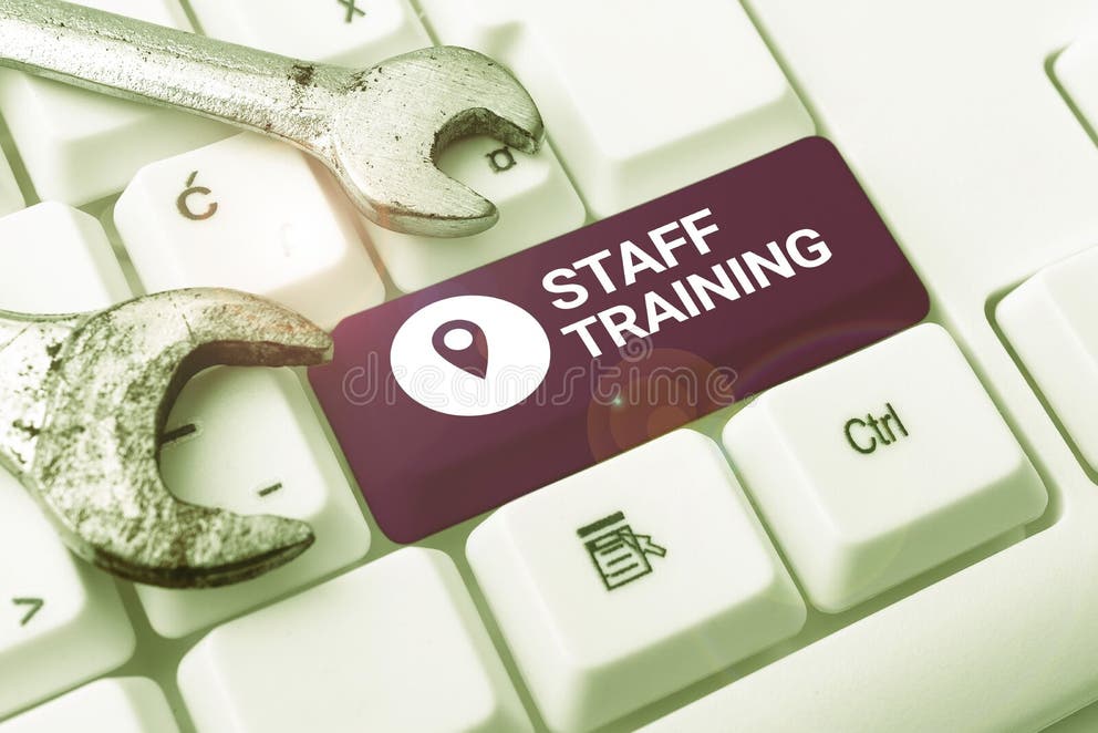 Sign Displaying Staff TrainingA Program that Helps Employees To Learn ...