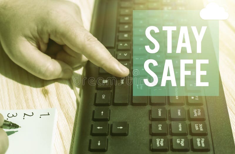 Sign Displaying Stay Safe. Word Written On Secure From Threat Of Danger ...