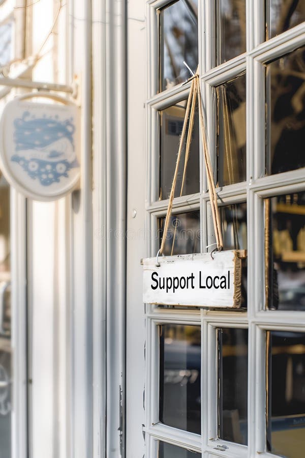 Sign on a Door of a Shop with Text Support Local Stock Image - Image of ...