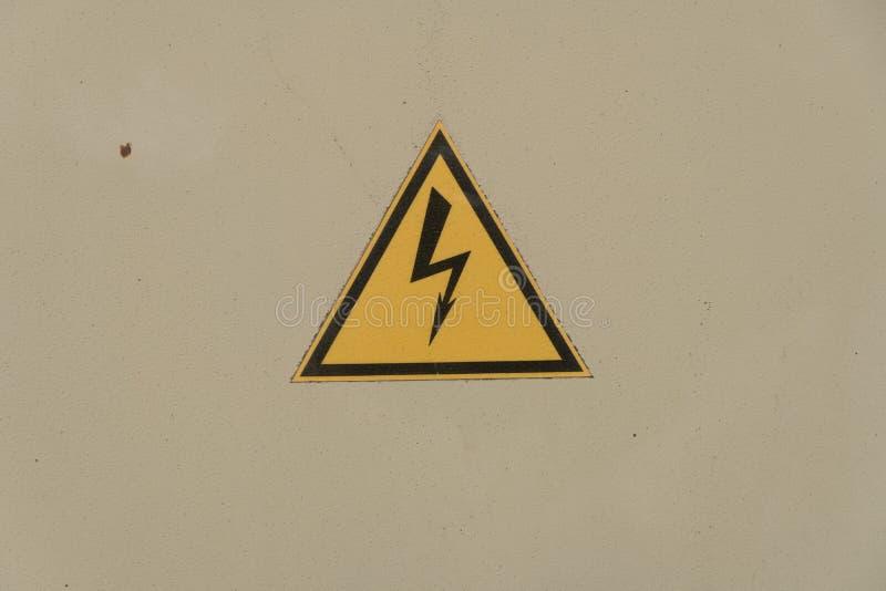 Sign Electrical Hazard Placed On A Rusty Metal Panel. Stock Photo ...