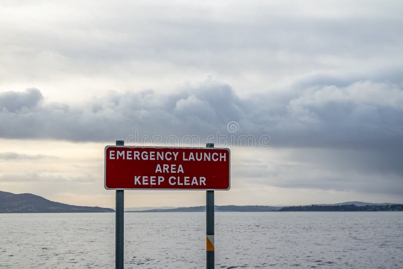 Sign Emergency Launch Area Keep Clear in Buncrana - Ireland Stock Image ...