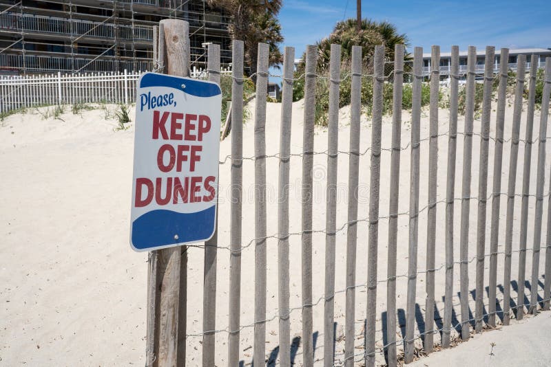 A Sign on a Fence that Says "Please Keep Off Dunes." Stock Image ...