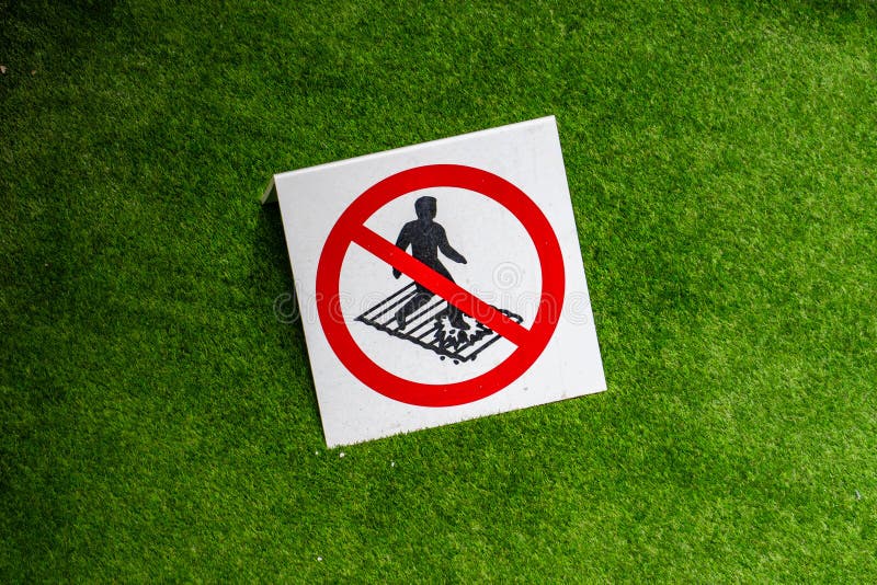 A Sign on the Grass that Says No One is Allowed To Walk on it Stock ...