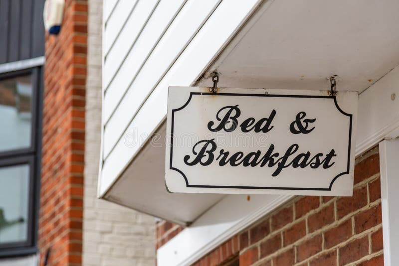 A Sign Hanging Outside an English Bed and Breakfast Stock Photo - Image ...