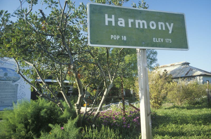 A sign for Harmony stock image. Image of elevation, text - 26283913