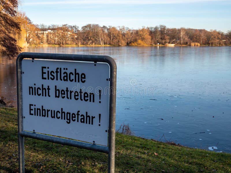 Sign Ice Break-in Danger in German Stock Image - Image of meadow ...