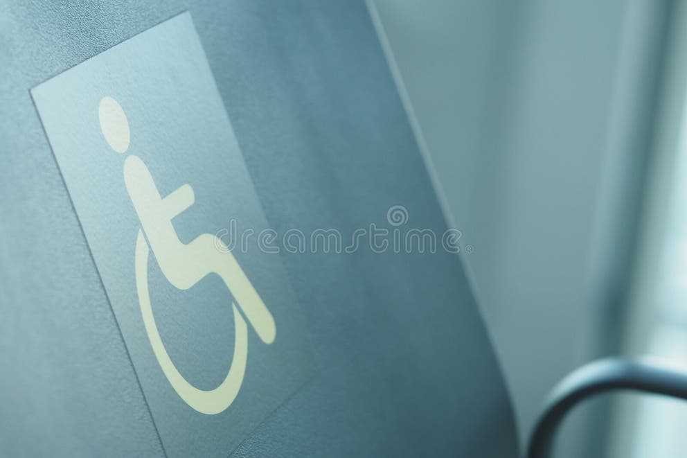 A Sign Indicating Accessible Seating for Passengers with Disabilities ...