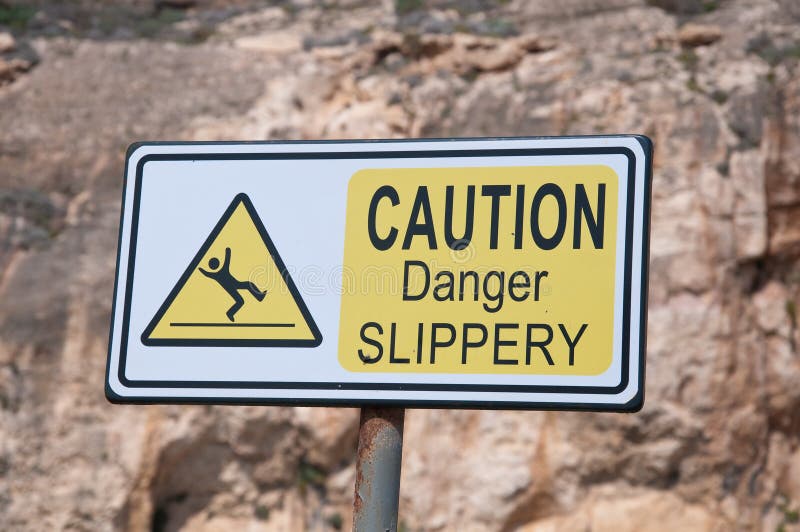 Sign Indicating Attention Danger of Slipping Stock Photo - Image of ...