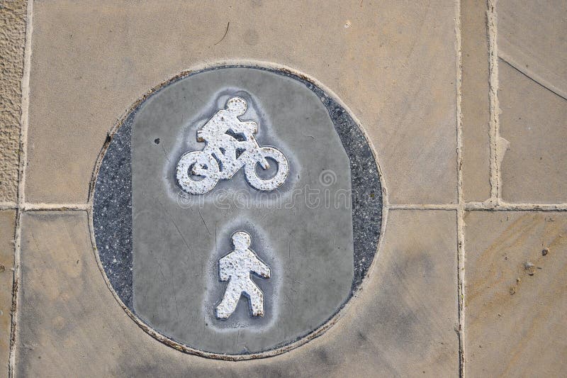 Sign Indicating Bicycle and Pedestrian Path on Pavement Stock Photo ...