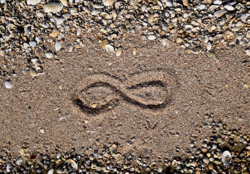 The Sign of Infinity on the Sea. Coastal Sand on the Beach Stock Image ...