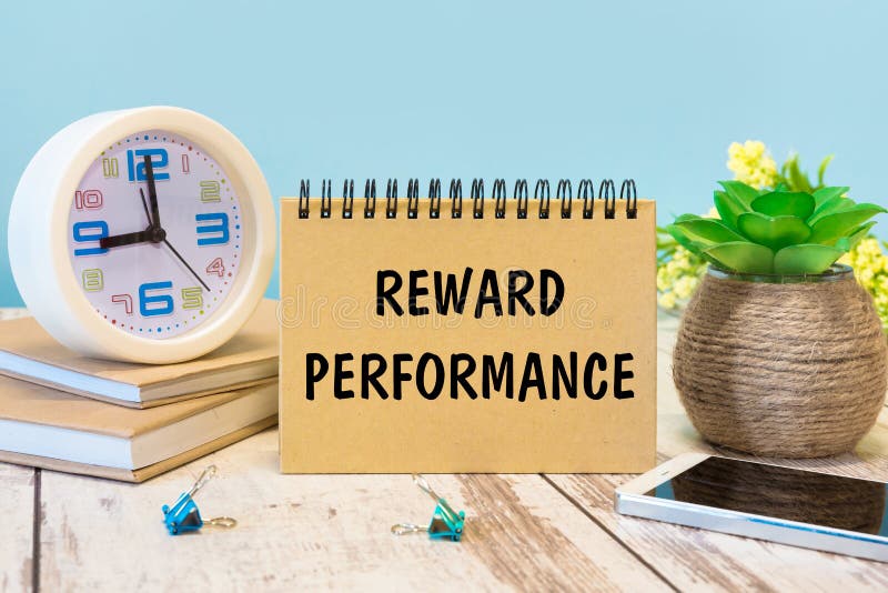 A Sign with the Inscription REWARD PERFORMANCE in Everything, on the ...