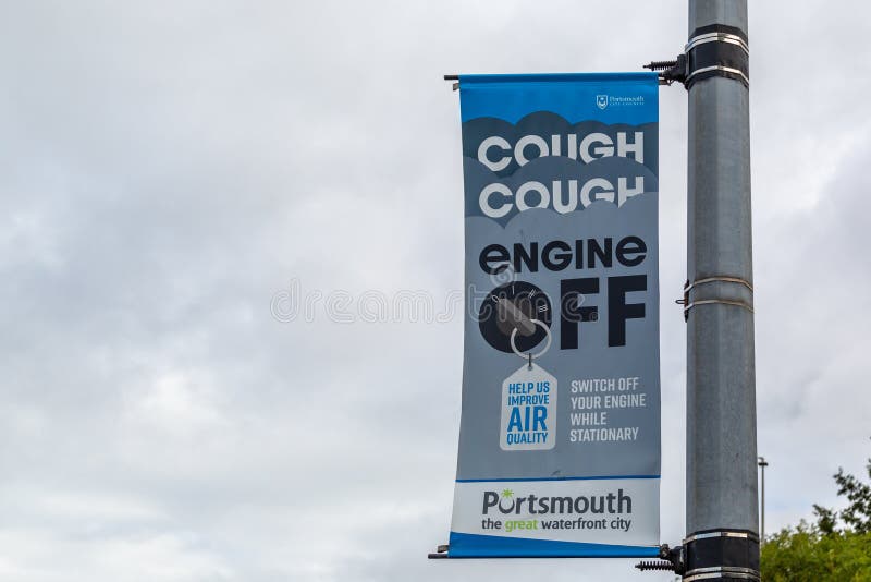 A Sign on a Lamppost Promoting Cleaner Air with the Slogan Cough Cough ...