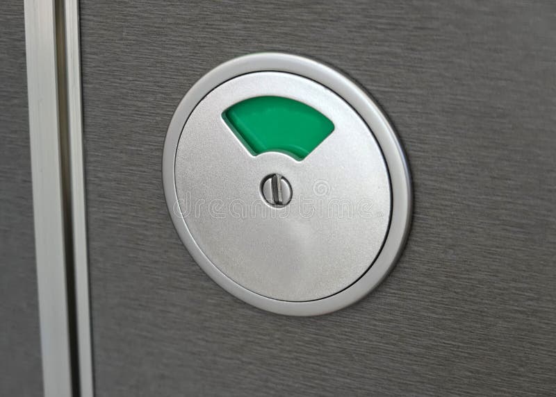 Sign of Lavatory with Green Vacant Label on Door Stock Photo - Image of ...