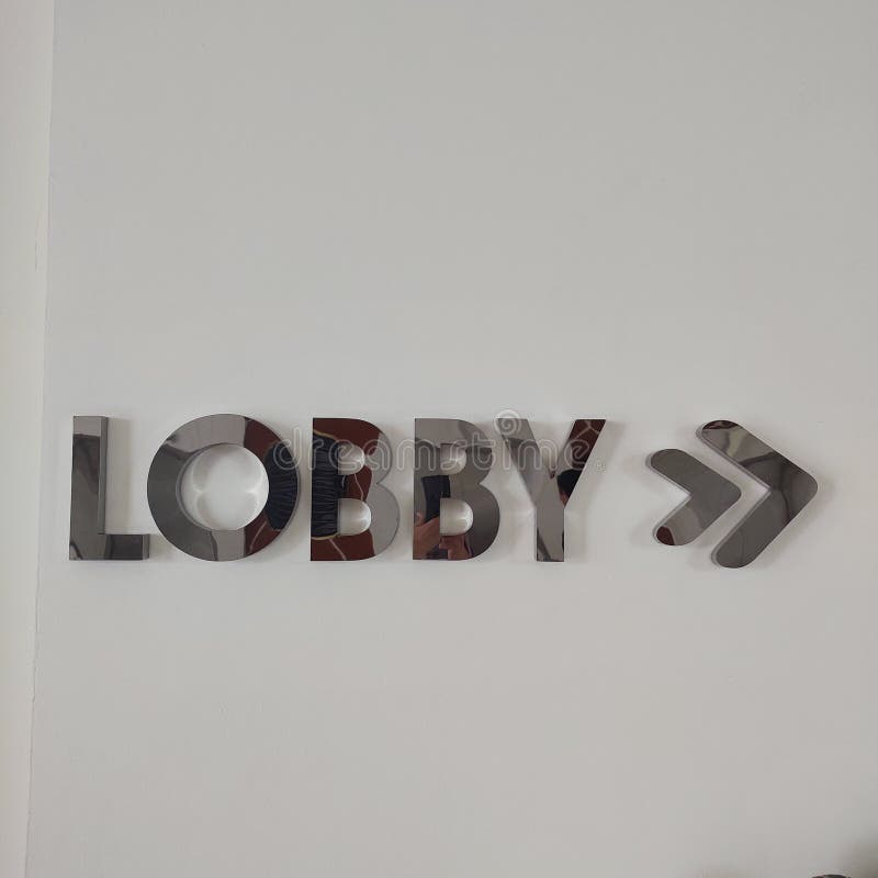 Sign of Lobby Direction on the White Wall Stock Image - Image of ...