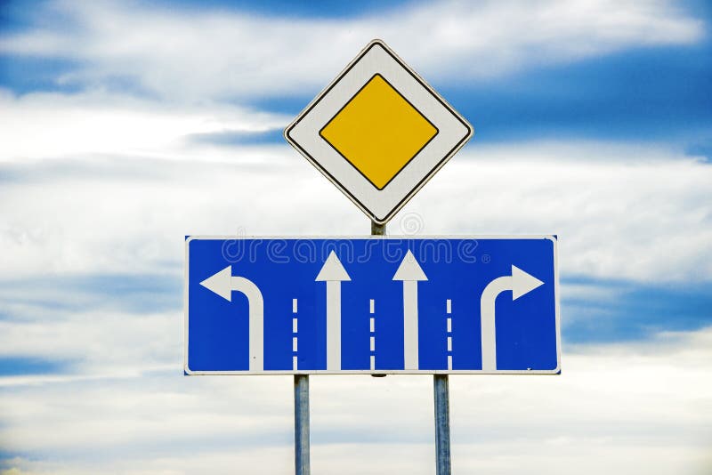 Sign of the Main Road and Four Areas Stock Photo - Image of attention ...