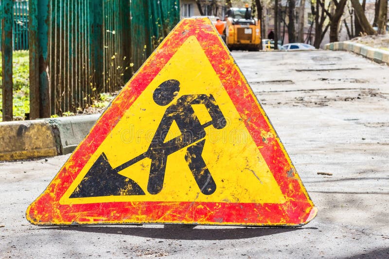 Construction Road Sign, A Man With Shovel And Stock Photo - Image of ...