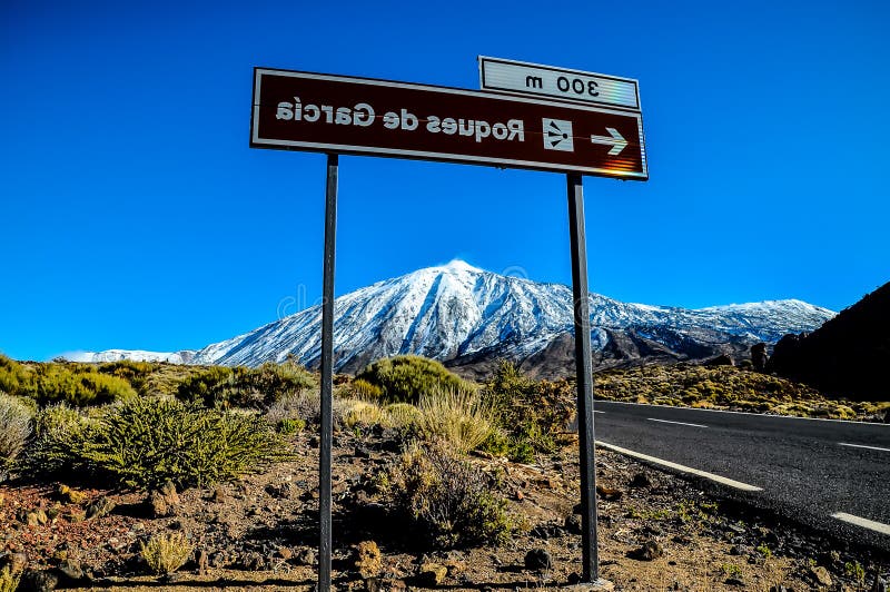 A Sign with the Number 300 on it is in Front of a Mountain Stock Image ...