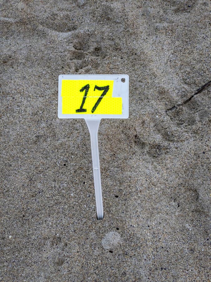 Sign with the Number 17 at Sandy Beach Stock Image - Image of county ...