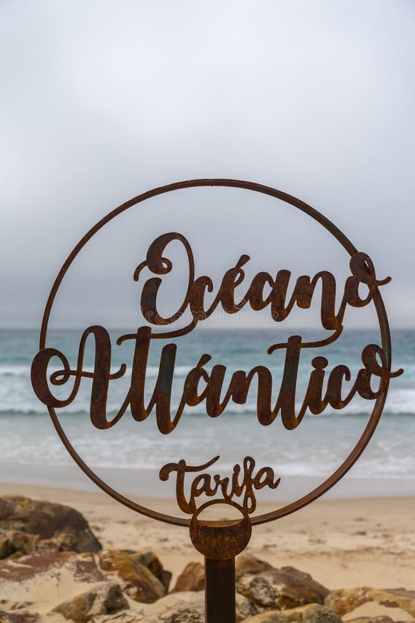 Sign on Palomas Island in Tarifa with the Atlantic Ocean Behind Stock ...