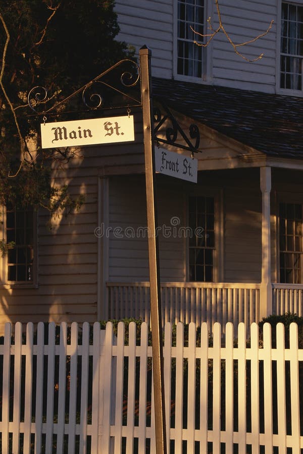 Sign Post at Corner of Main St. and Front St Stock Image - Image of ...
