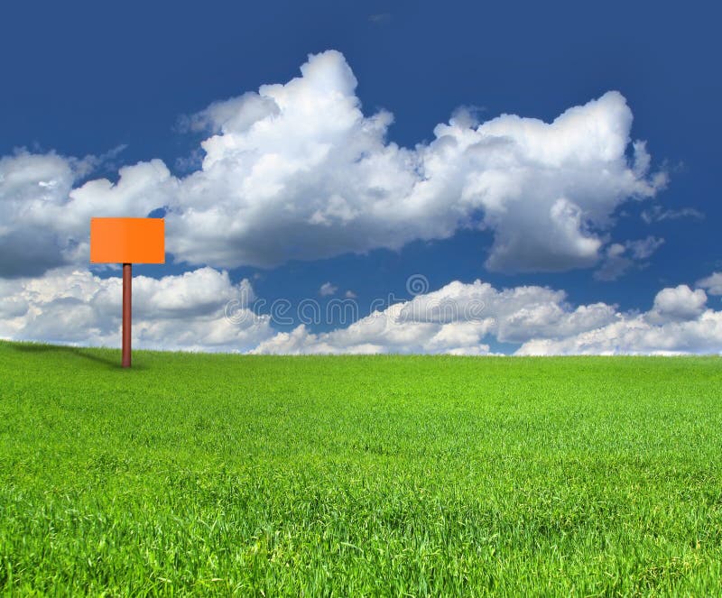 Sign post on green meadow stock photo. Image of information - 4491008
