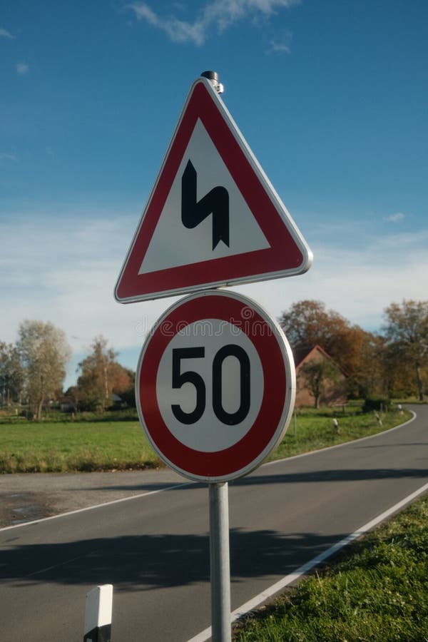 A Sign with a Red and White Triangle and the Number 50 on it Stock ...