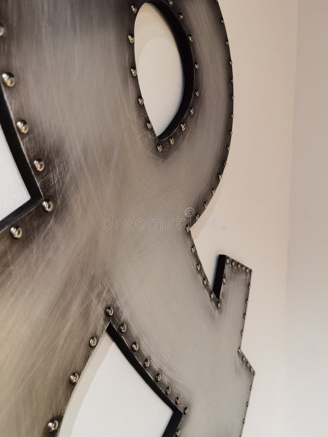 The Sign for and is Reinforced with Rivets Stock Image - Image of sign ...