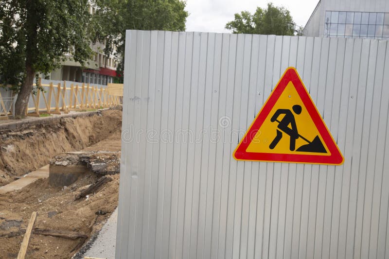 Sign Repair Work.Repair and Replacement of Pipes in the City Stock ...