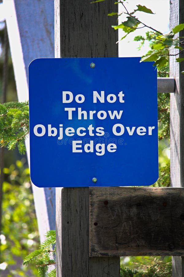 A Sign Requesting Objects Not Be Thrown Over a Platform Edge Stock ...