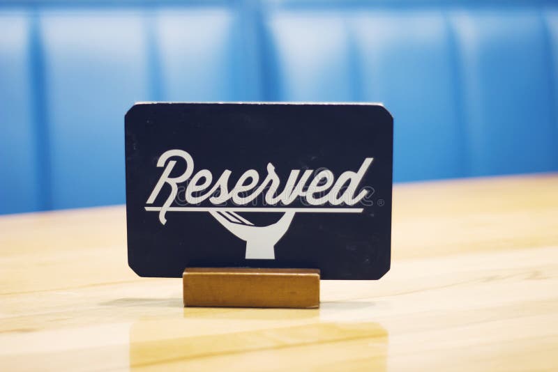 The Sign Reserved on the Empty Table in a Cafe Stock Image - Image of ...