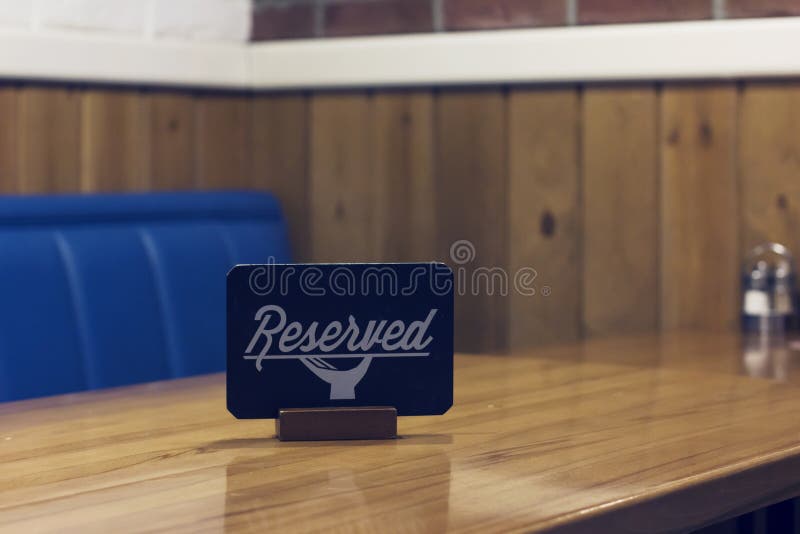 The Sign Reserved on the Empty Table in a Cafe Stock Image - Image of ...
