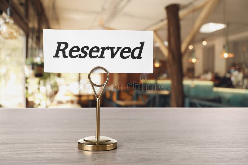 Sign Reserved on Wooden Table in Restaurant Stock Image - Image of ...