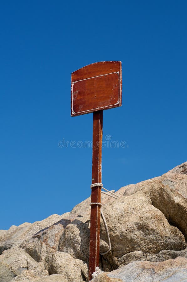 Sign on Rocks stock photo. Image of signage, concept - 17818164